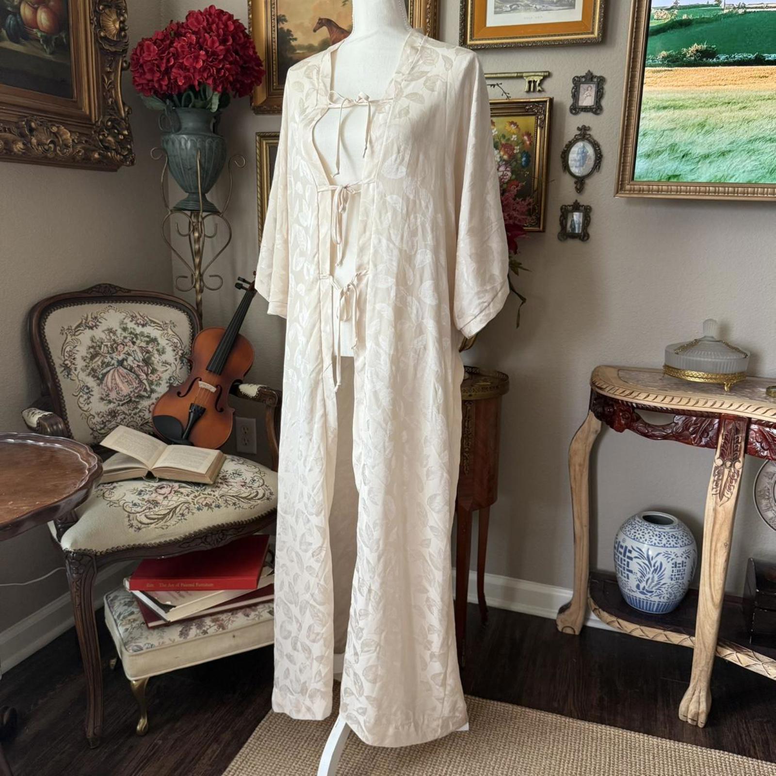 Cream and tan vintage 1970s Coran Noamair long robe with tie front kim ...